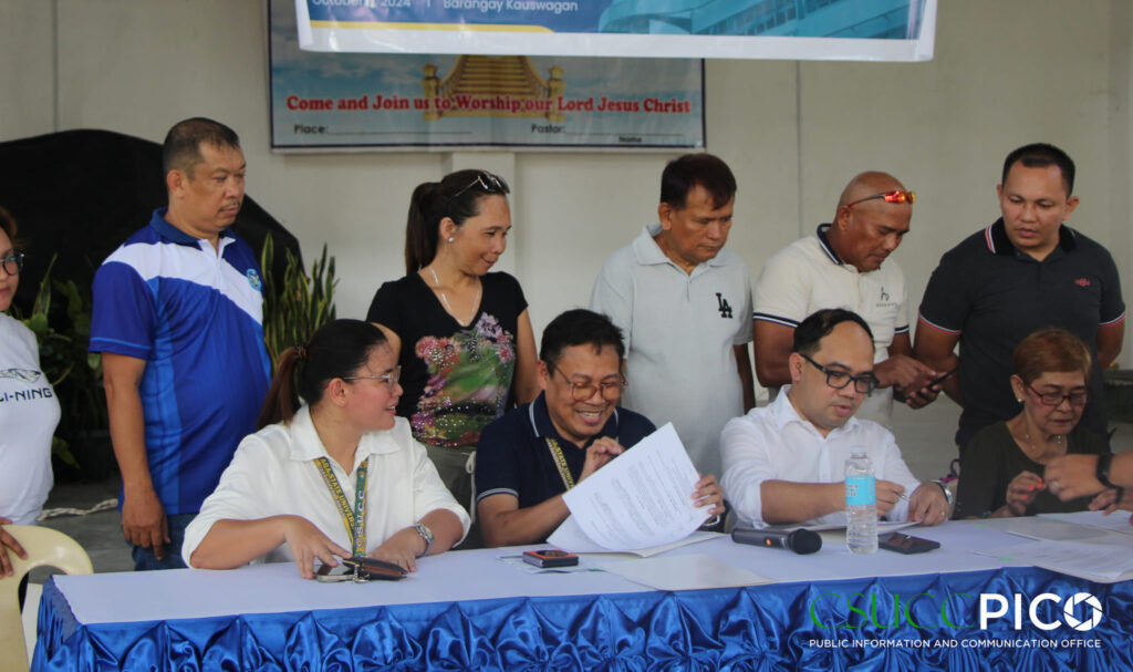 CSUCC Inks MOA with Barangay Kauswagan - CARAGA STATE UNIVERSITY
